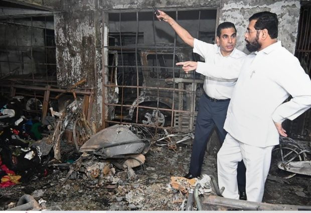 Maha CM meets residents of SRA building which caught fire, announces Rs ... Maha CM meets residents of SRA building which caught fire, announces Rs ...